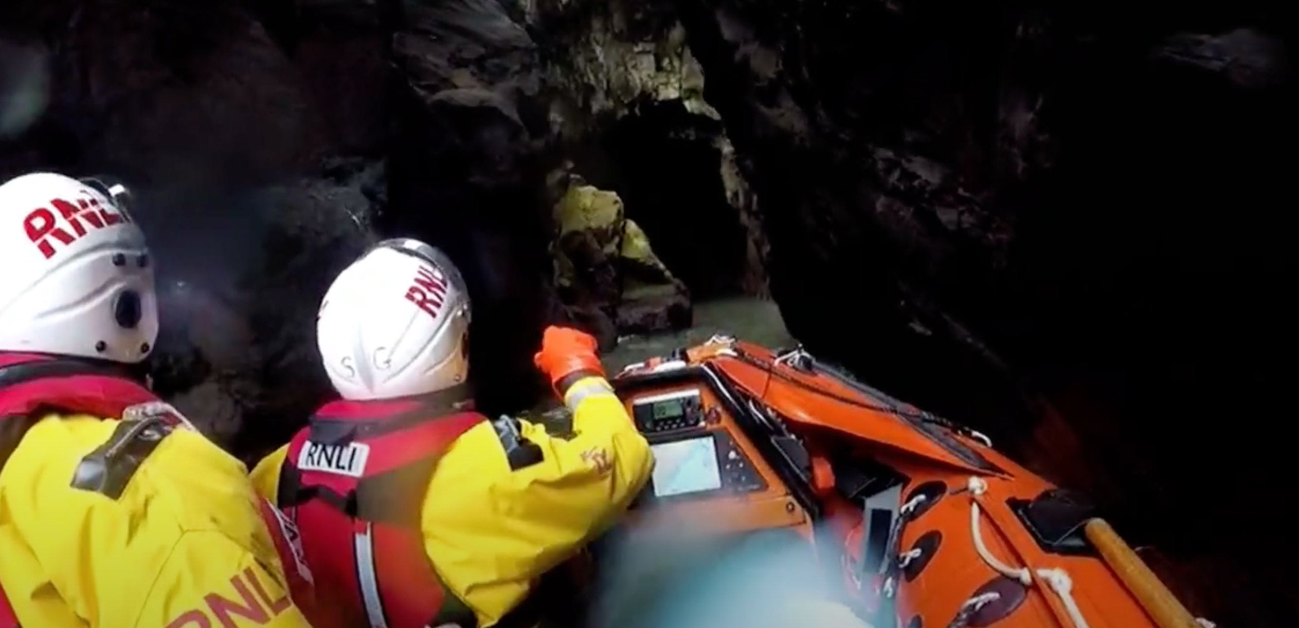 Watch: Lifeboat weaves through narrow tunnels to save dog in cliff fall ...